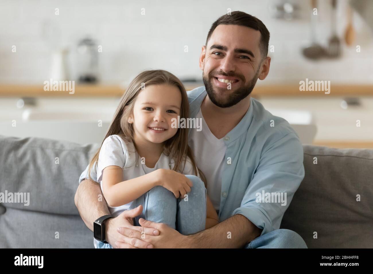 Happy young affectionate dad bonding with little child girl Stock Photo ...