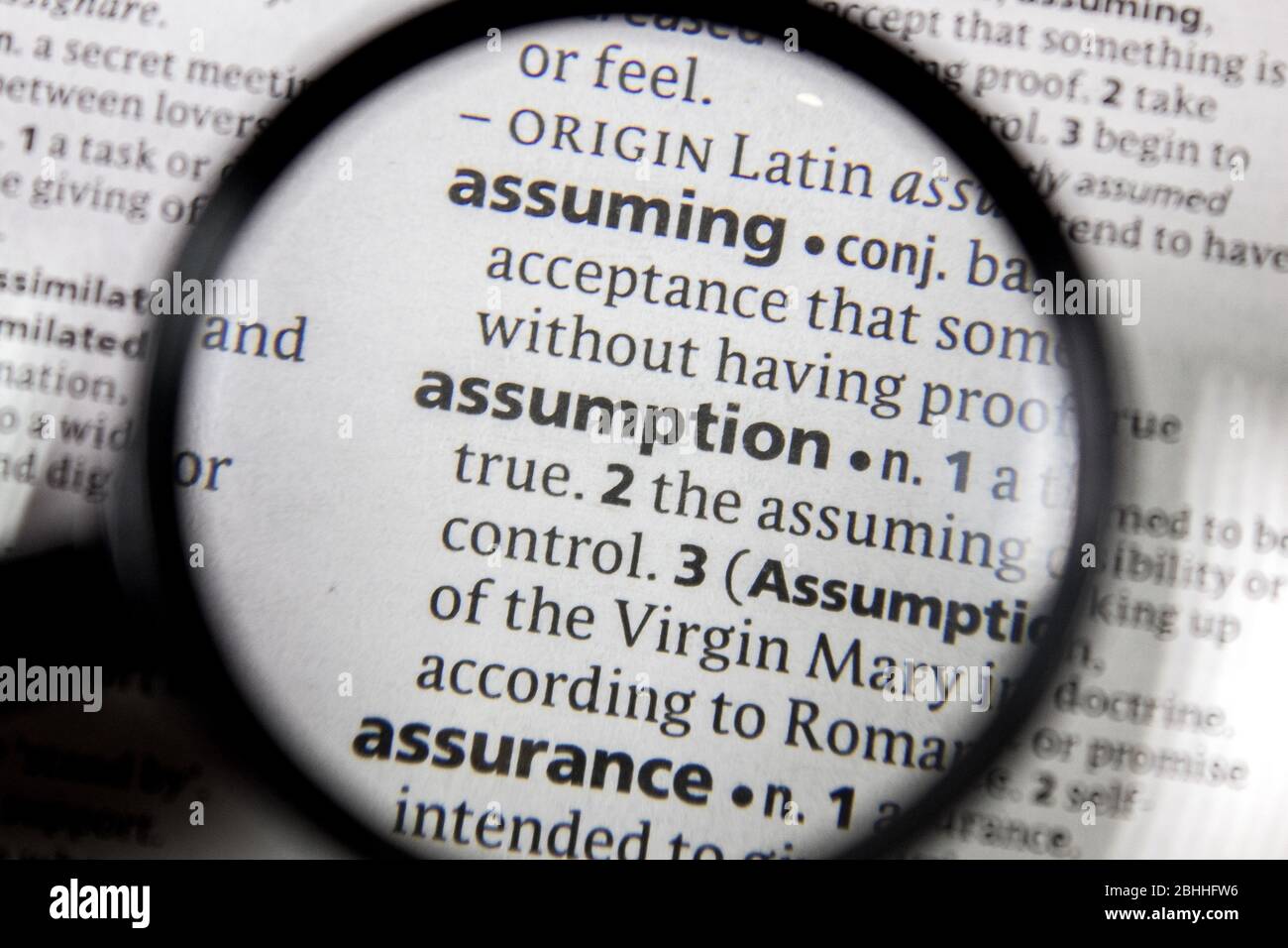 The word or phrase assumption in a dictionary book Stock Photo - Alamy