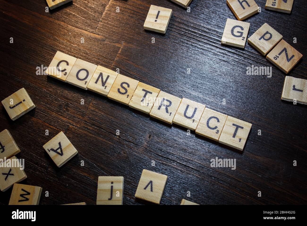 Word or phrase Construct made with scrabble letters on black table ...