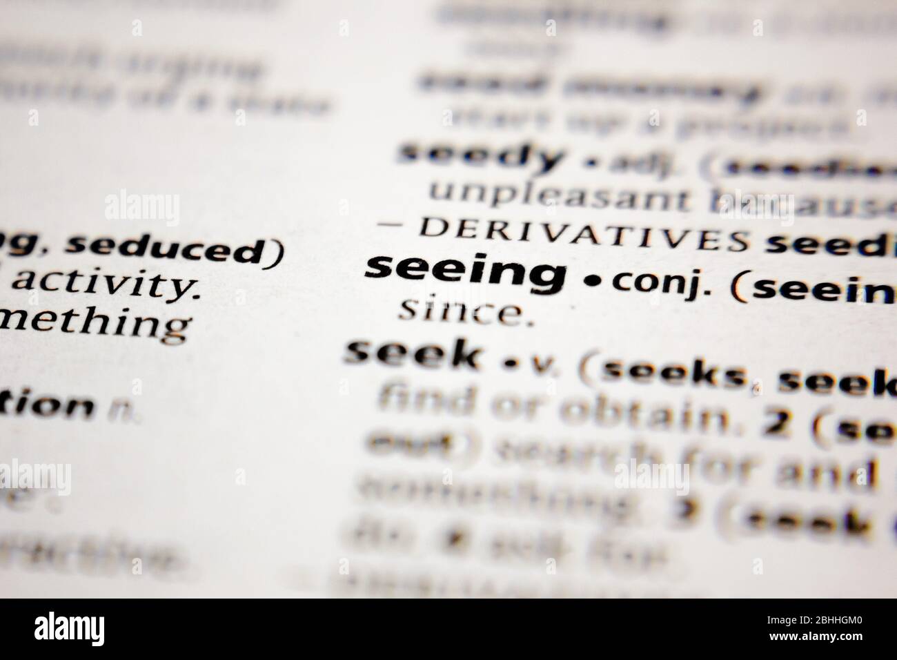 Word or phrase seeing in a dictionary Stock Photo - Alamy