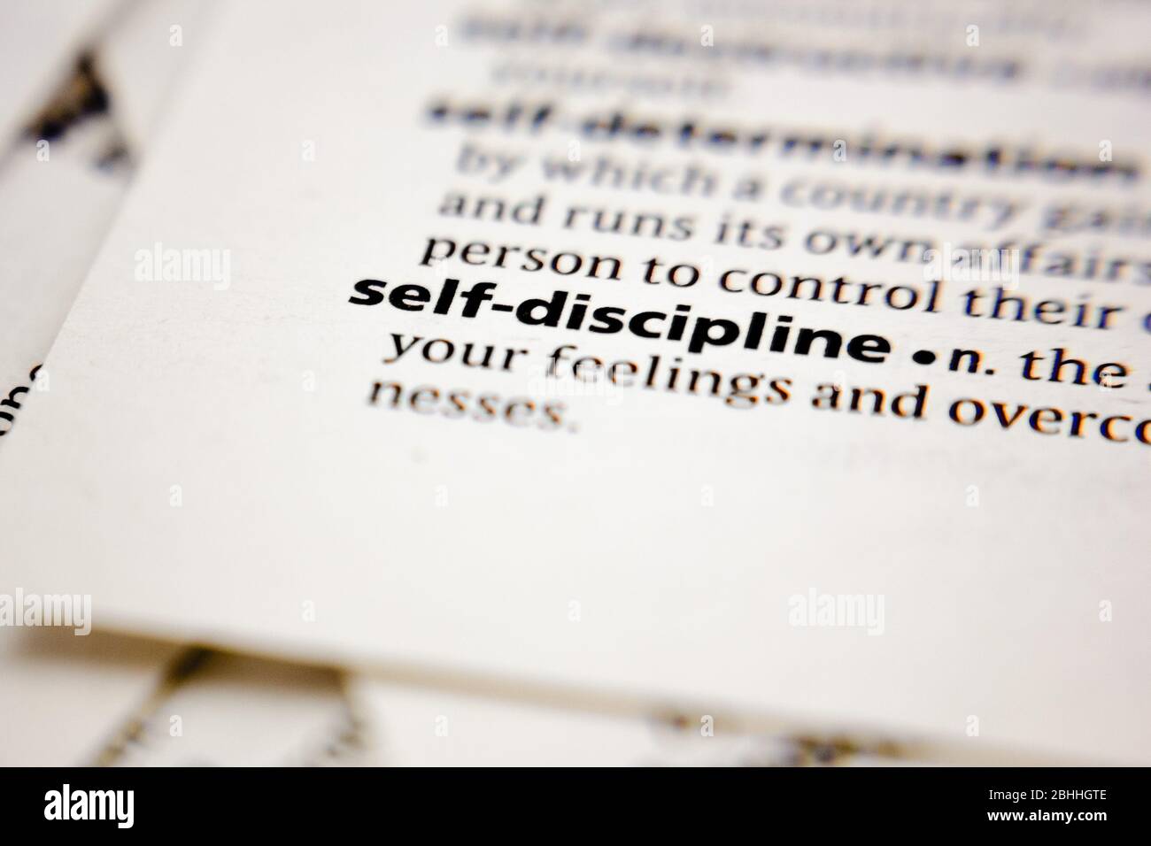 Word or phrase self-discipline in a dictionary Stock Photo - Alamy