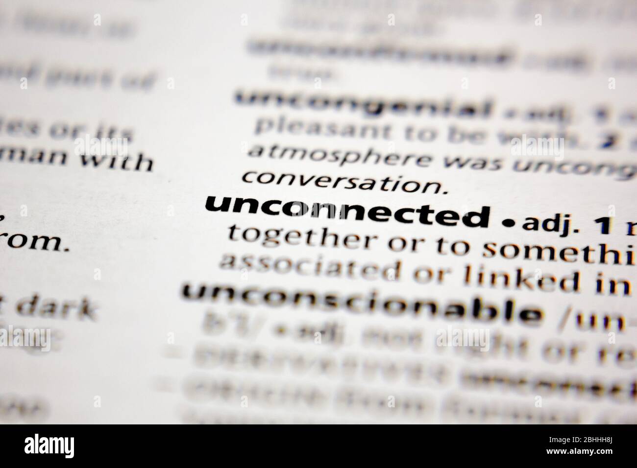 Word or phrase unconnected in a dictionary Stock Photo - Alamy