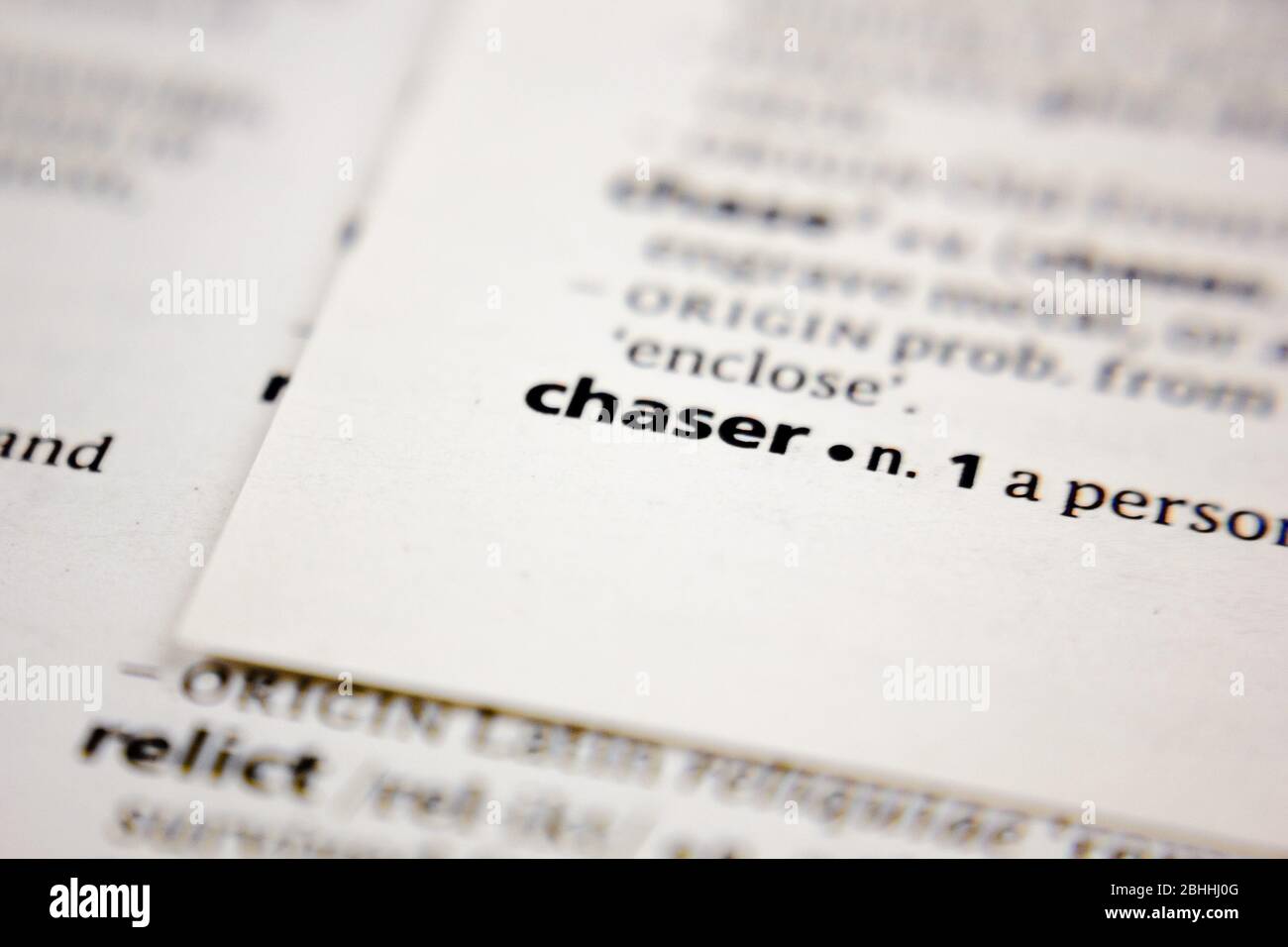 Word or phrase chaser in a dictionary Stock Photo - Alamy