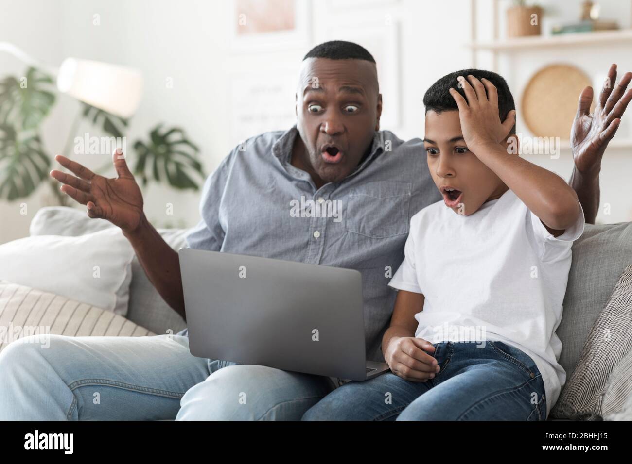 Inappropriate Content. Shocked african grandfather and his grandson ...