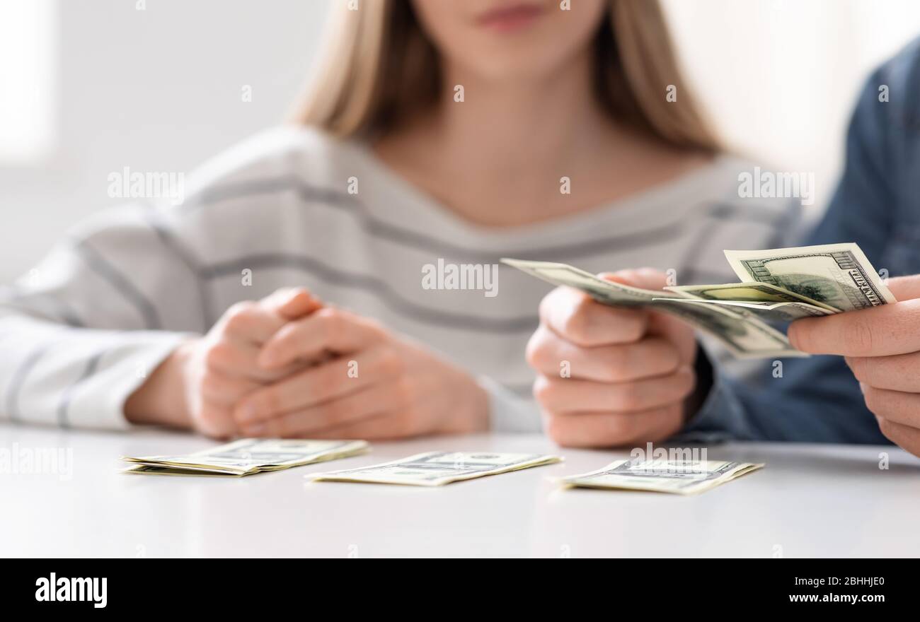 Poor woman counting money hi-res stock photography and images - Alamy