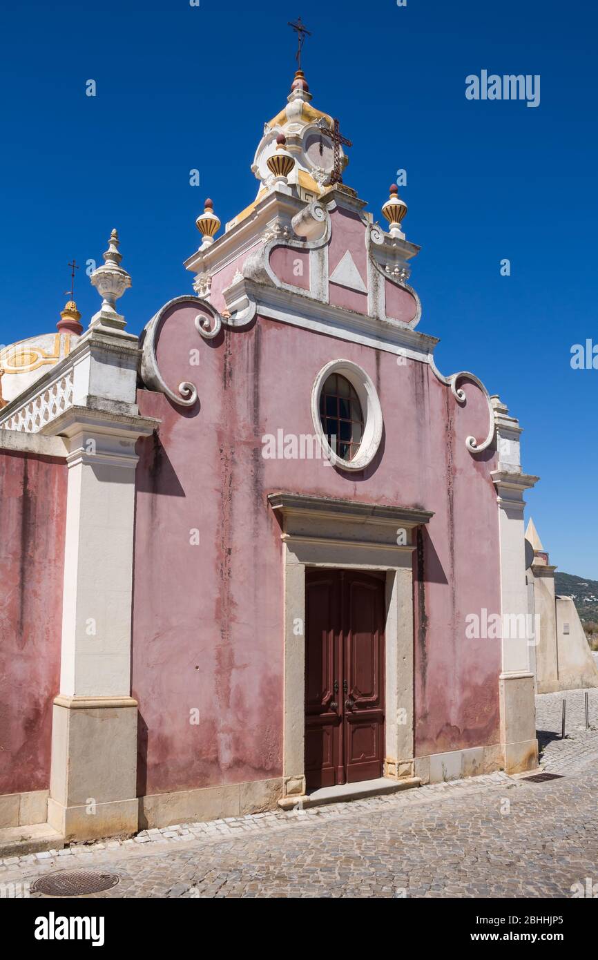 Light bordeaux color of the walls, white details. Palace Estoi built in ...