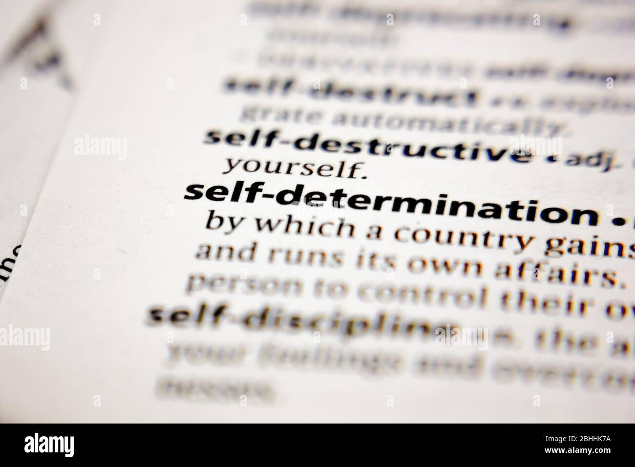 Word or phrase self-determination in a dictionary Stock Photo - Alamy