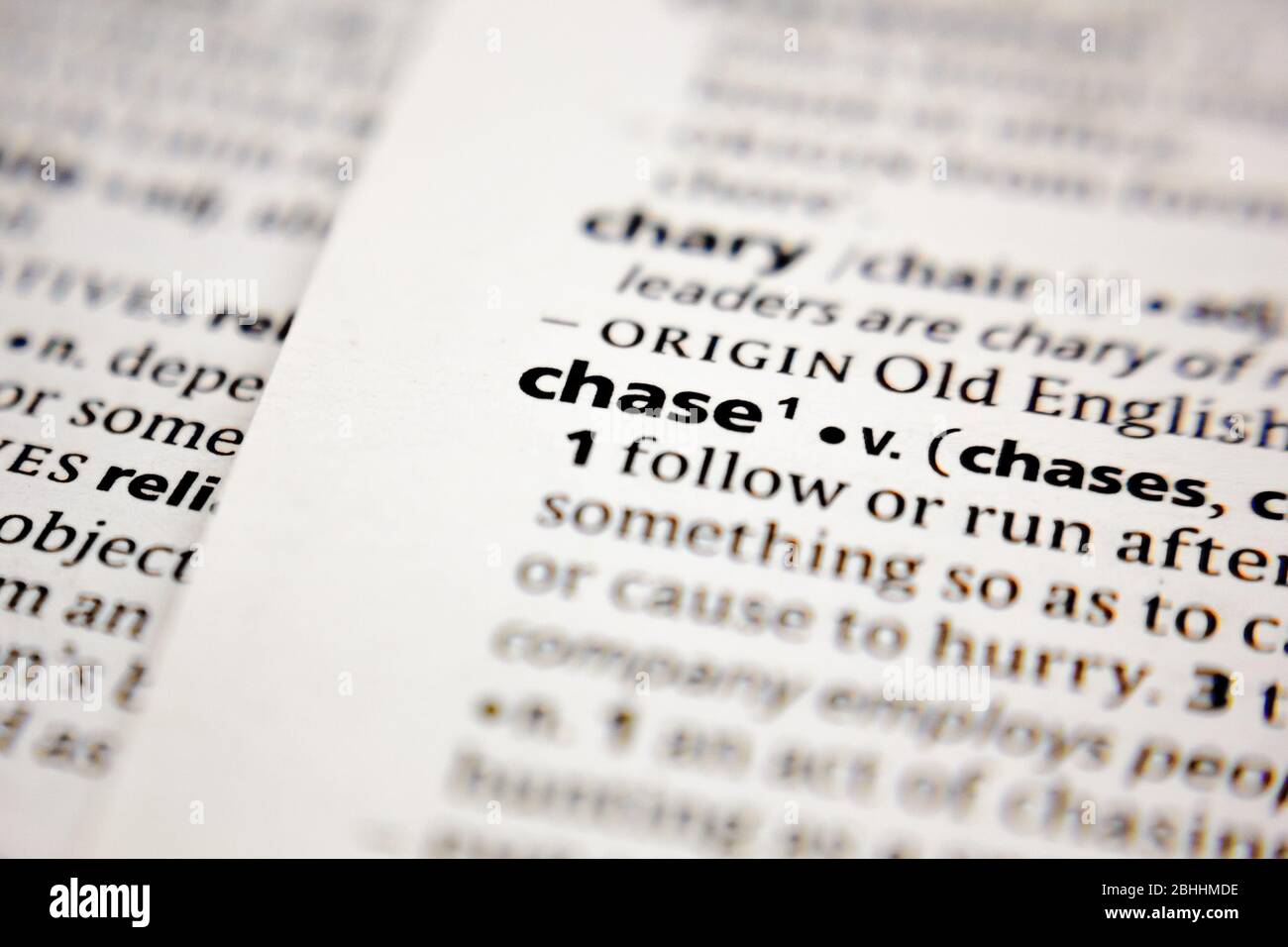 Word or phrase chase in a dictionary Stock Photo - Alamy