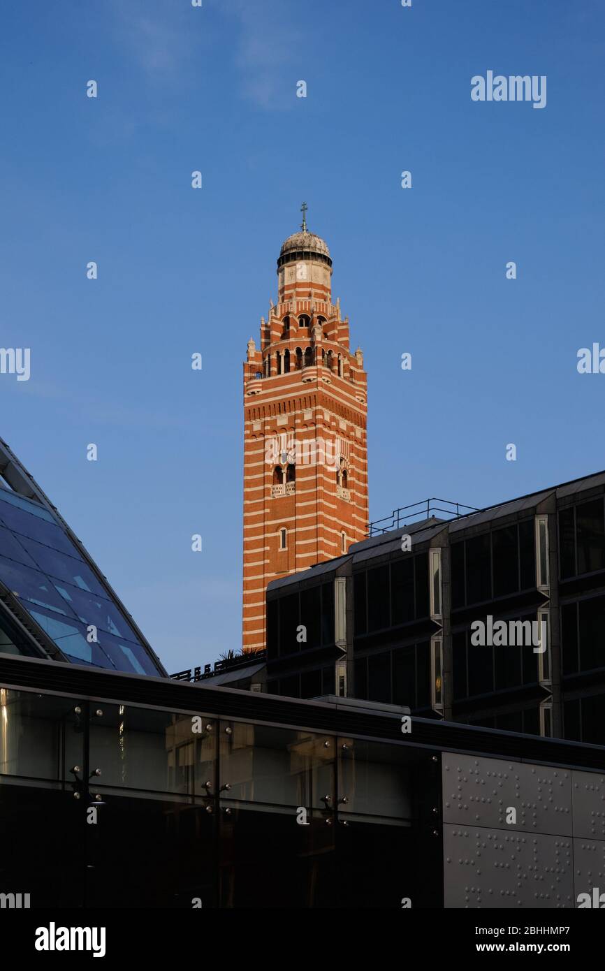 Westminster Cathedral clock tower over modern building skyline Stock ...