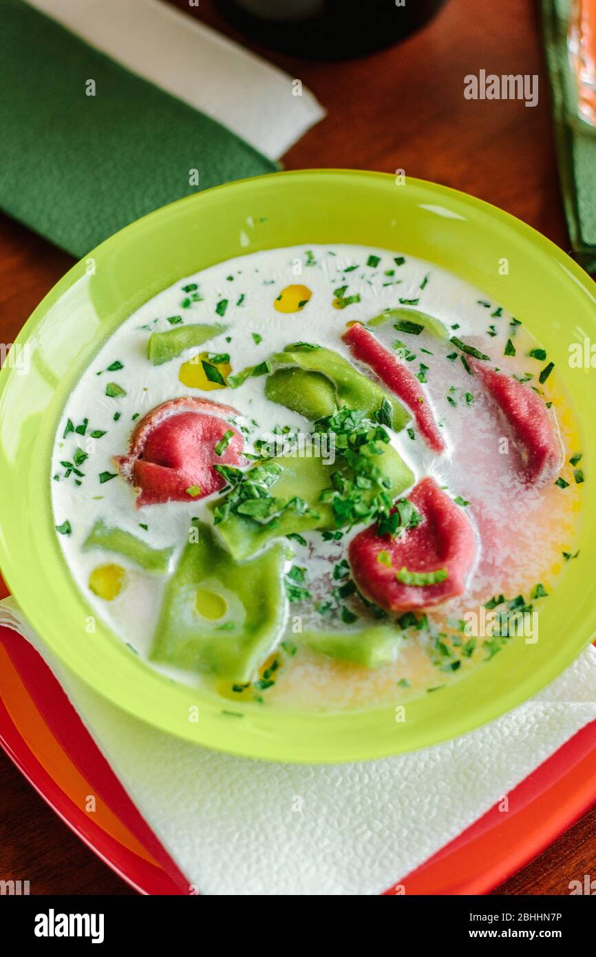 Green and red ravioli in soup for kids, great image for your needs ...