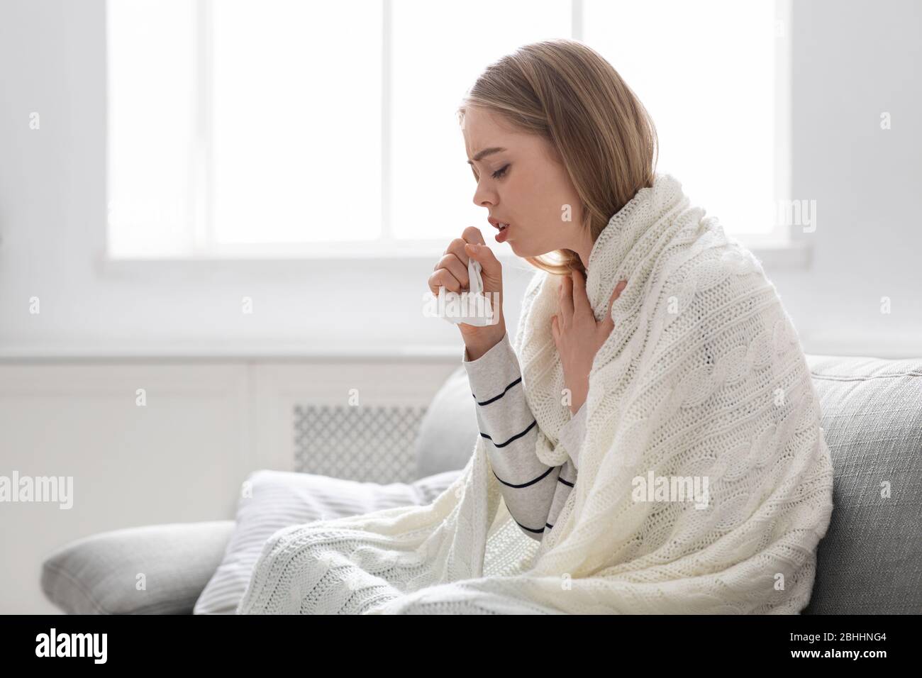 Woman coughing hi-res stock photography and images - Alamy