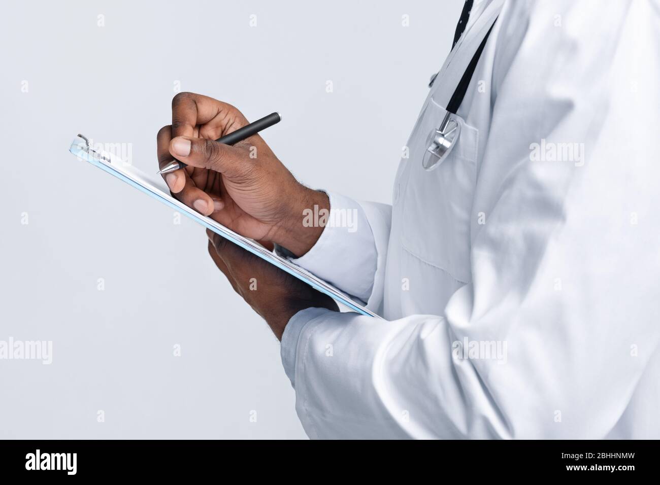 African american doctor filling hi-res stock photography and images - Alamy