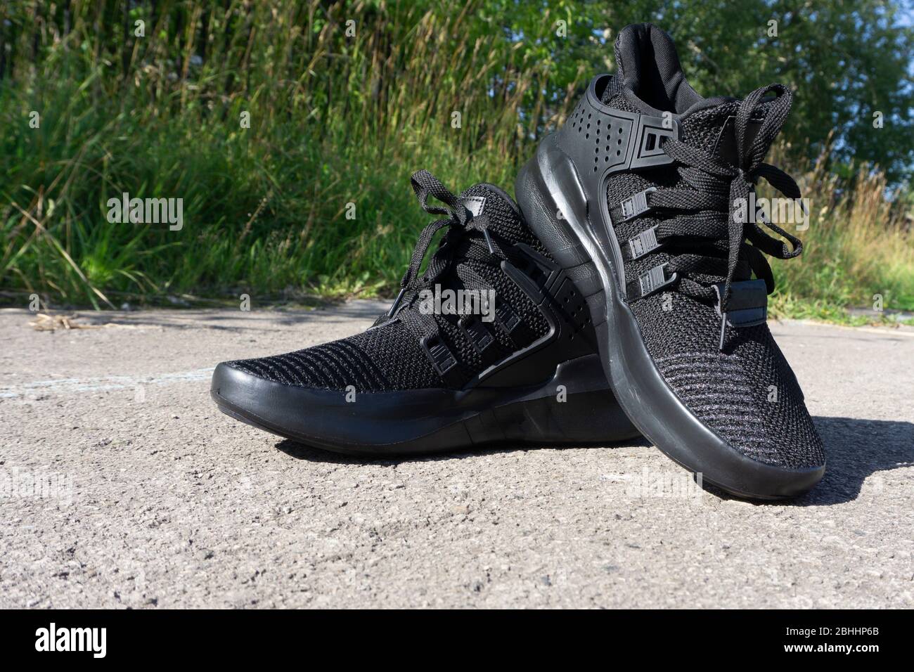 Side view of sneaker in white background Stock Photo - Alamy