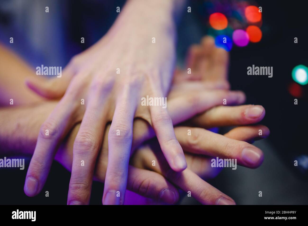 Team unity, athletes folded their hands on each other before cyber ...