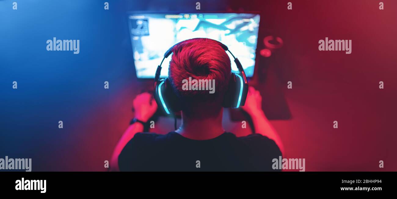 Blurred background professional gamer playing tournaments online games ...