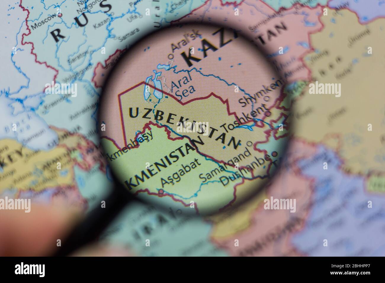 Uzbekistan on the map of the world or atlas Stock Photo - Alamy