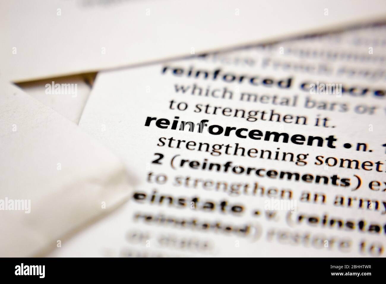 Word or phrase reinforcement in a dictionary Stock Photo - Alamy
