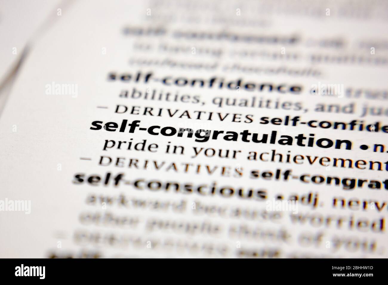 Word or phrase self-congratulation in a dictionary Stock Photo - Alamy