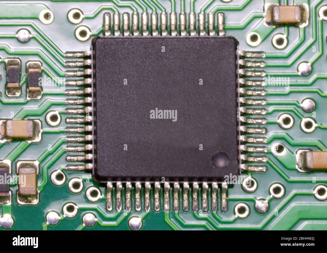 macro photography of a large computer chip on an electronic board Stock ...