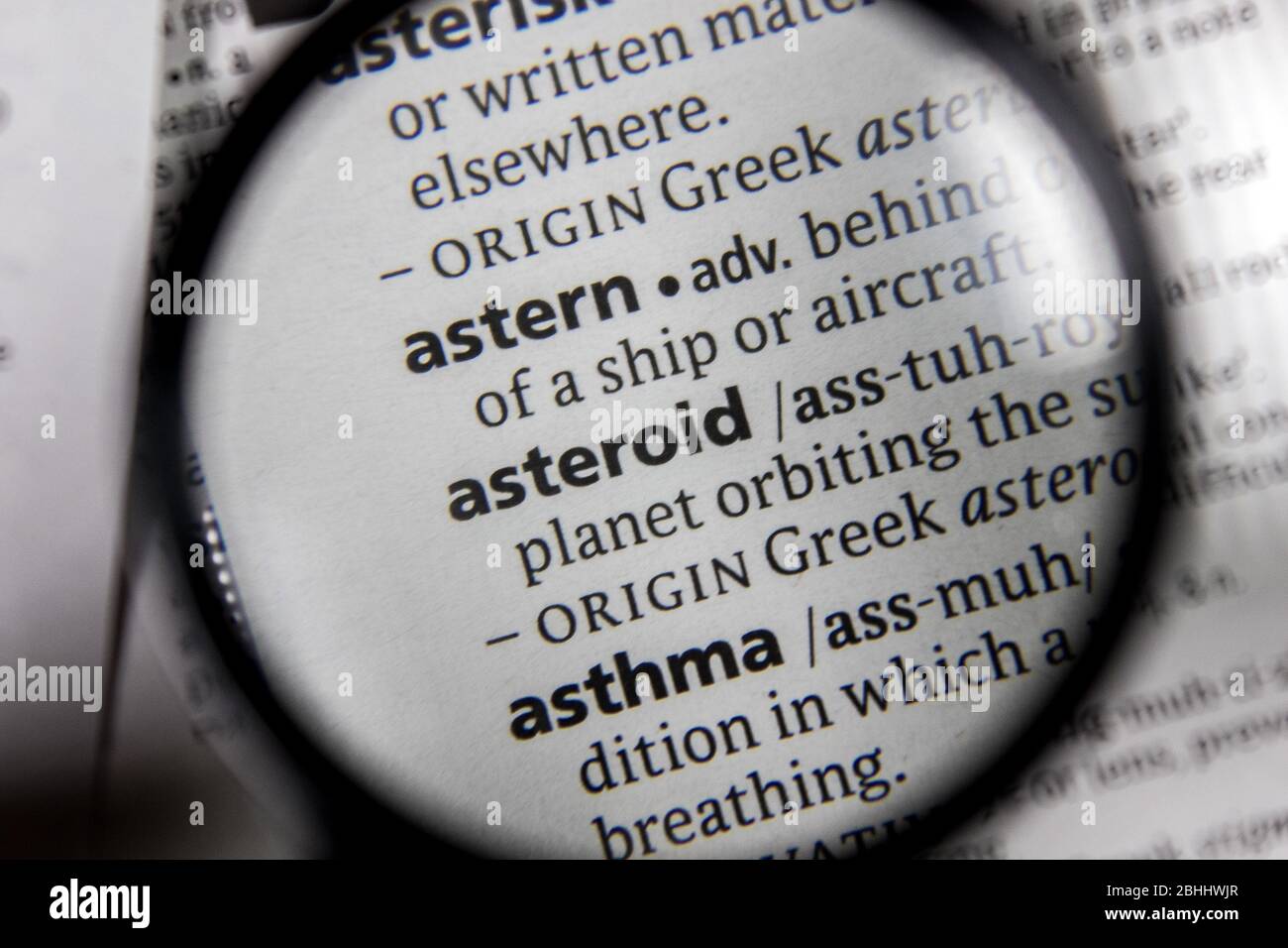 The word or phrase asteroid in a dictionary book Stock Photo - Alamy