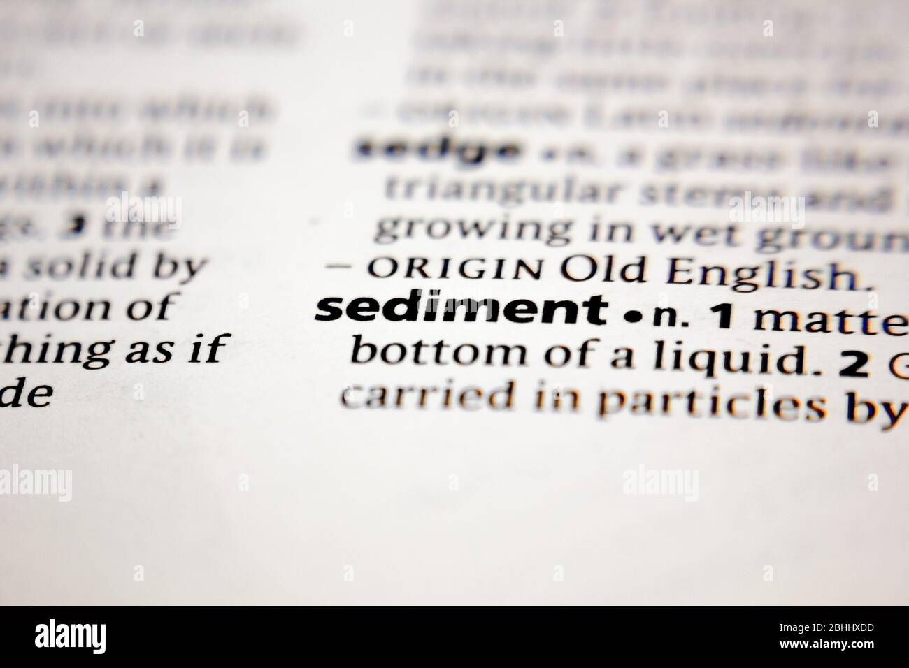 Word or phrase sediment in a dictionary Stock Photo - Alamy