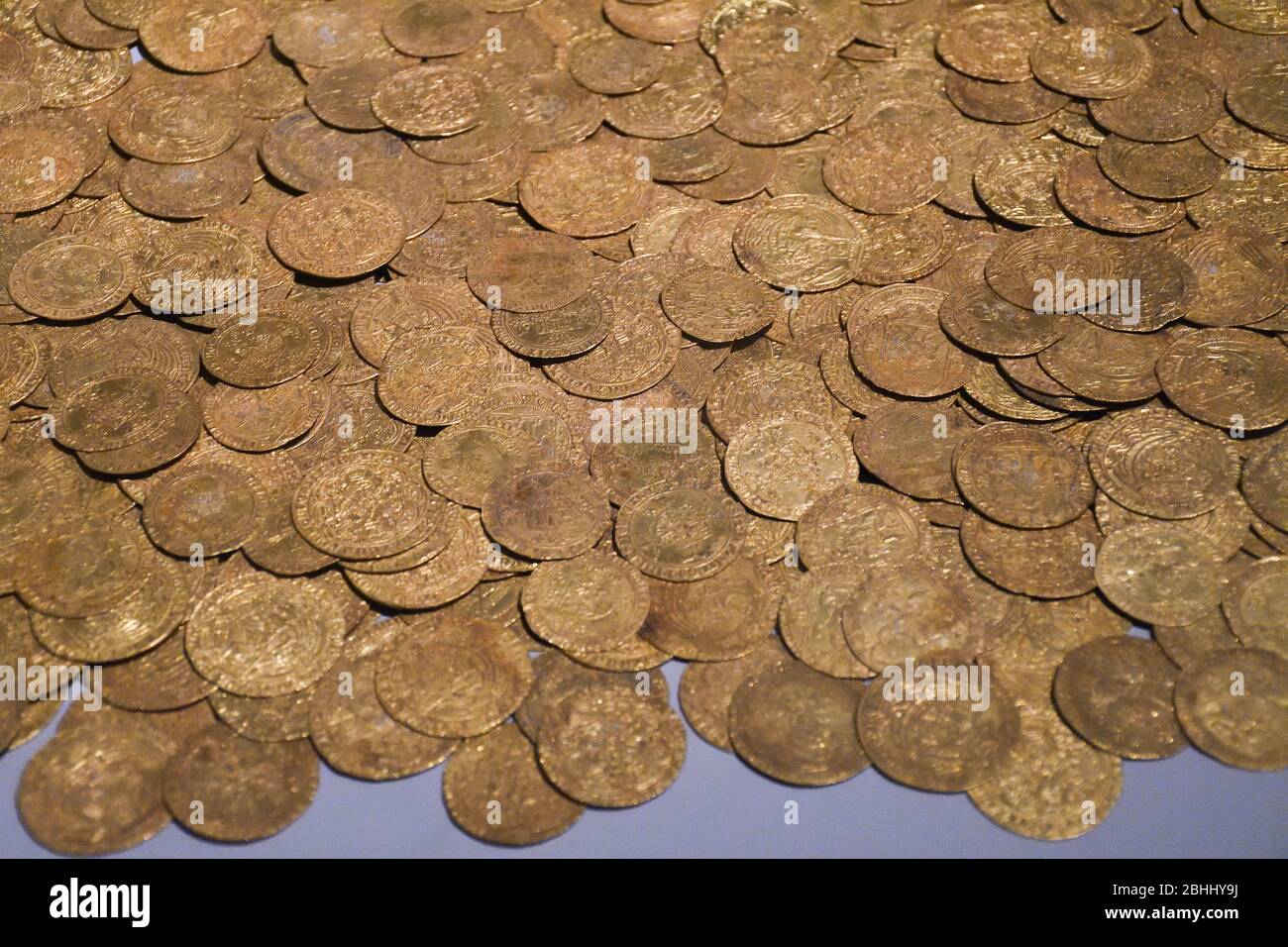 London, United Kingdom, 25th of January 2020: Old gold vintage coins ...