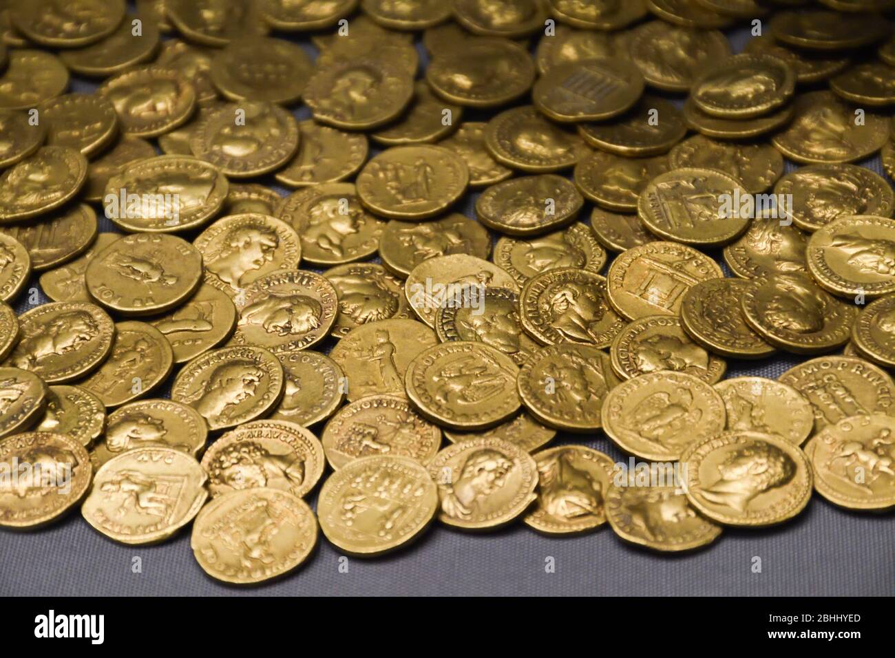 London, United Kingdom, 25th of January 2020: Old gold vintage coins ...