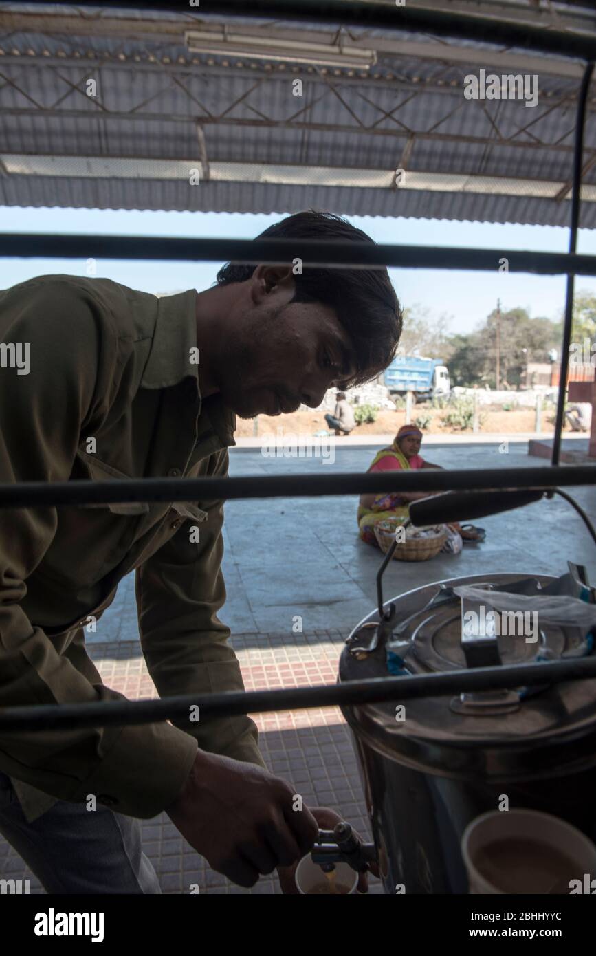 Mahoba / India 26 February 2017 Indian railway vendor selling tea to ...
