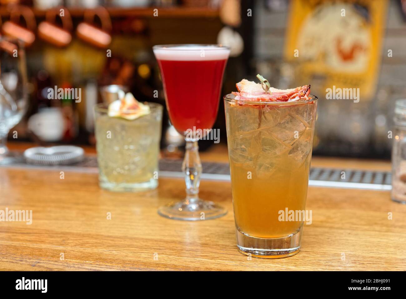 Three different cocktails on bar counter Stock Photo - Alamy