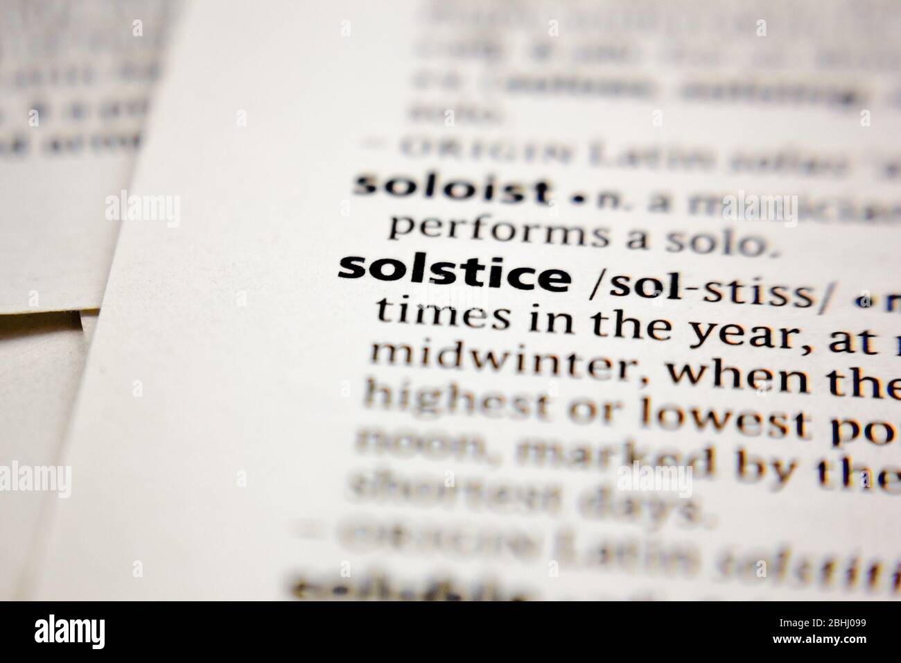 Word or phrase solstice in a dictionary Stock Photo - Alamy