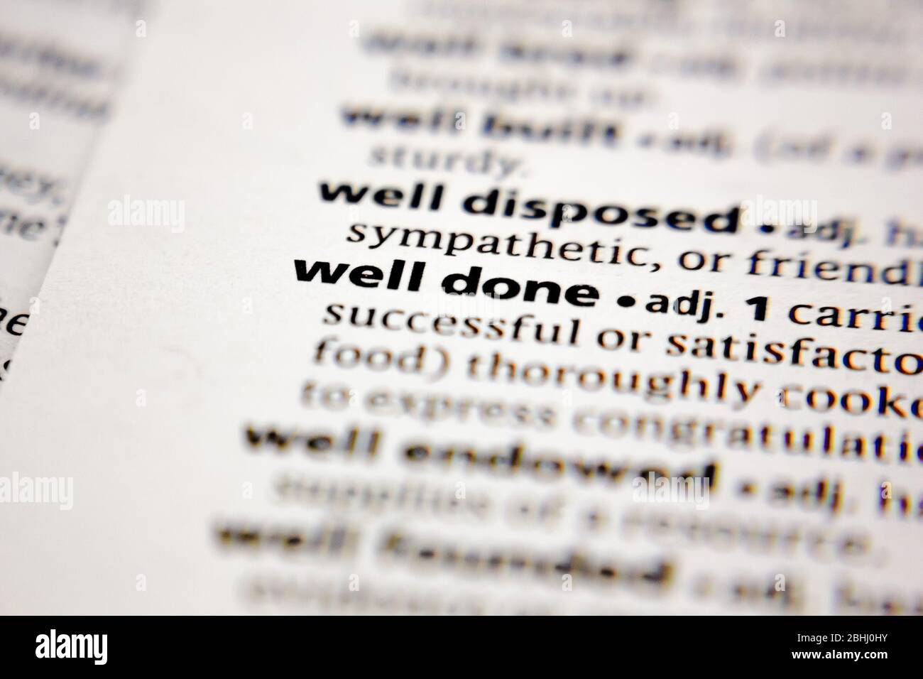 Word or phrase well done in a dictionary Stock Photo - Alamy