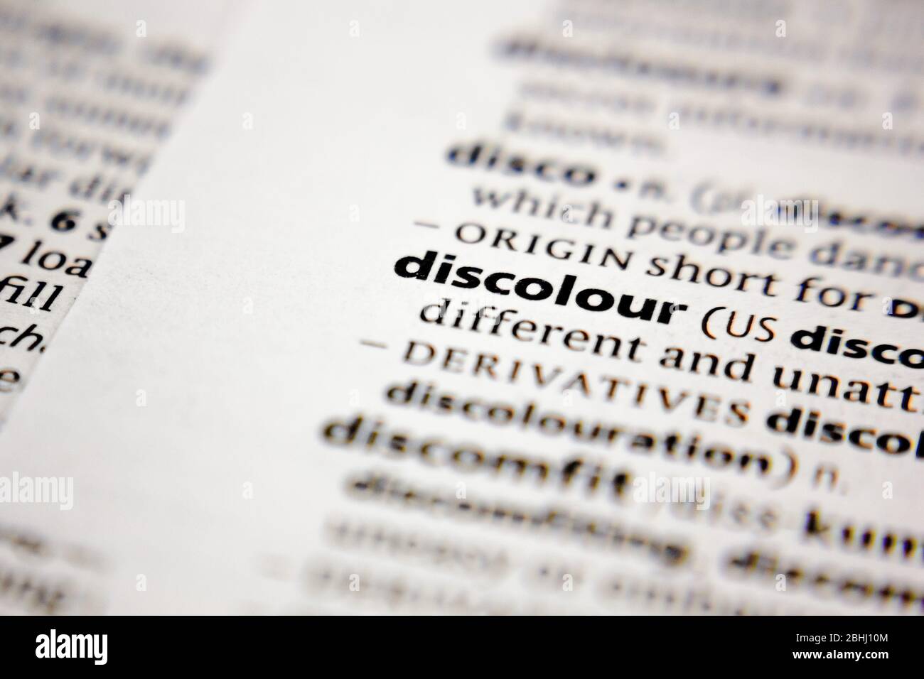 Word or phrase discolour in a dictionary Stock Photo - Alamy
