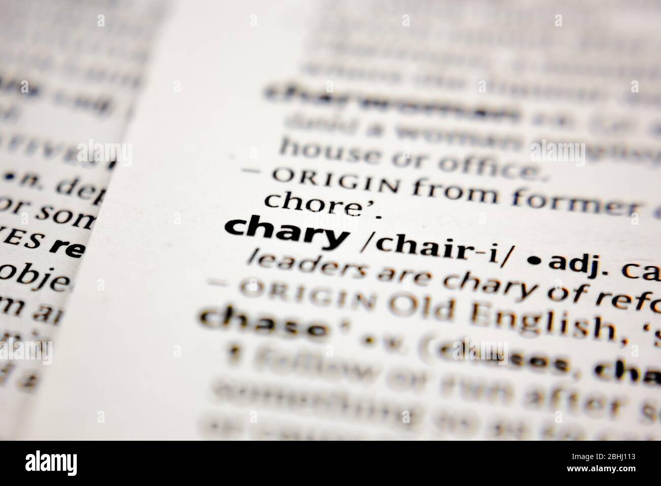 Word or phrase chary in a dictionary Stock Photo - Alamy