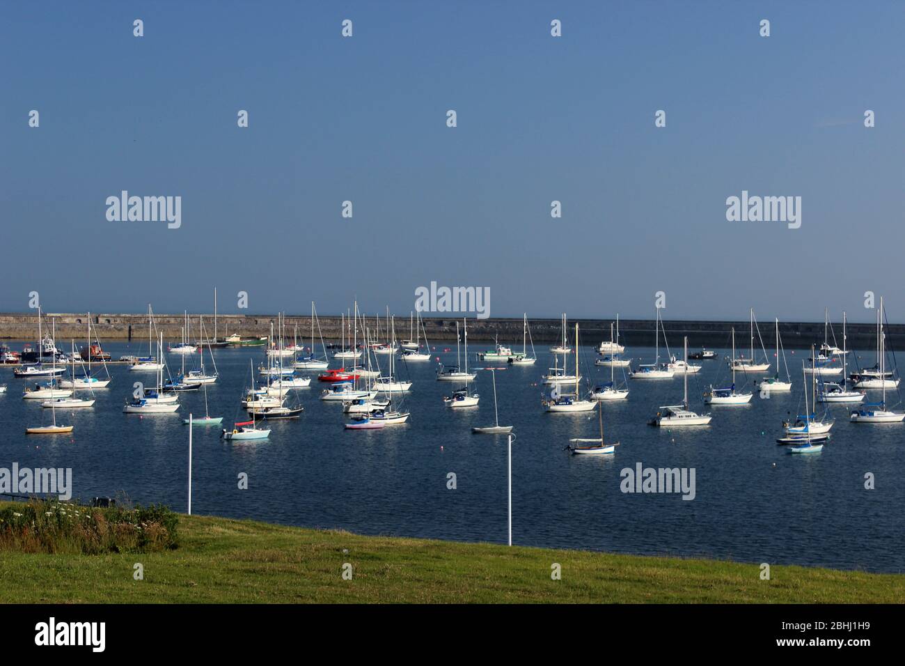 Holyhead marina and harbour wall, Anglesey, Wales Stock Photo - Alamy
