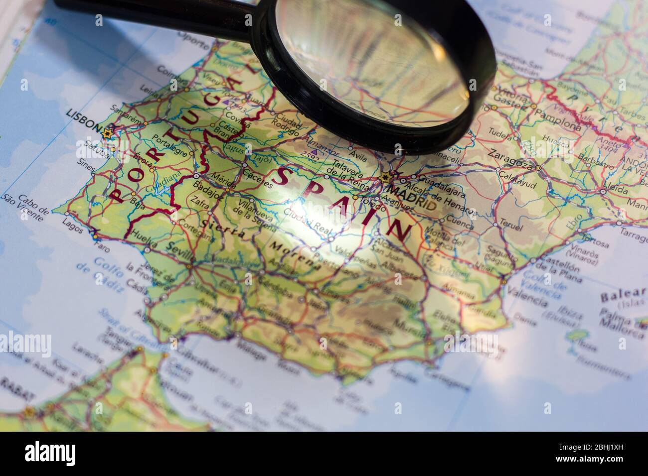 Spain on the map of the world or atlas Stock Photo - Alamy