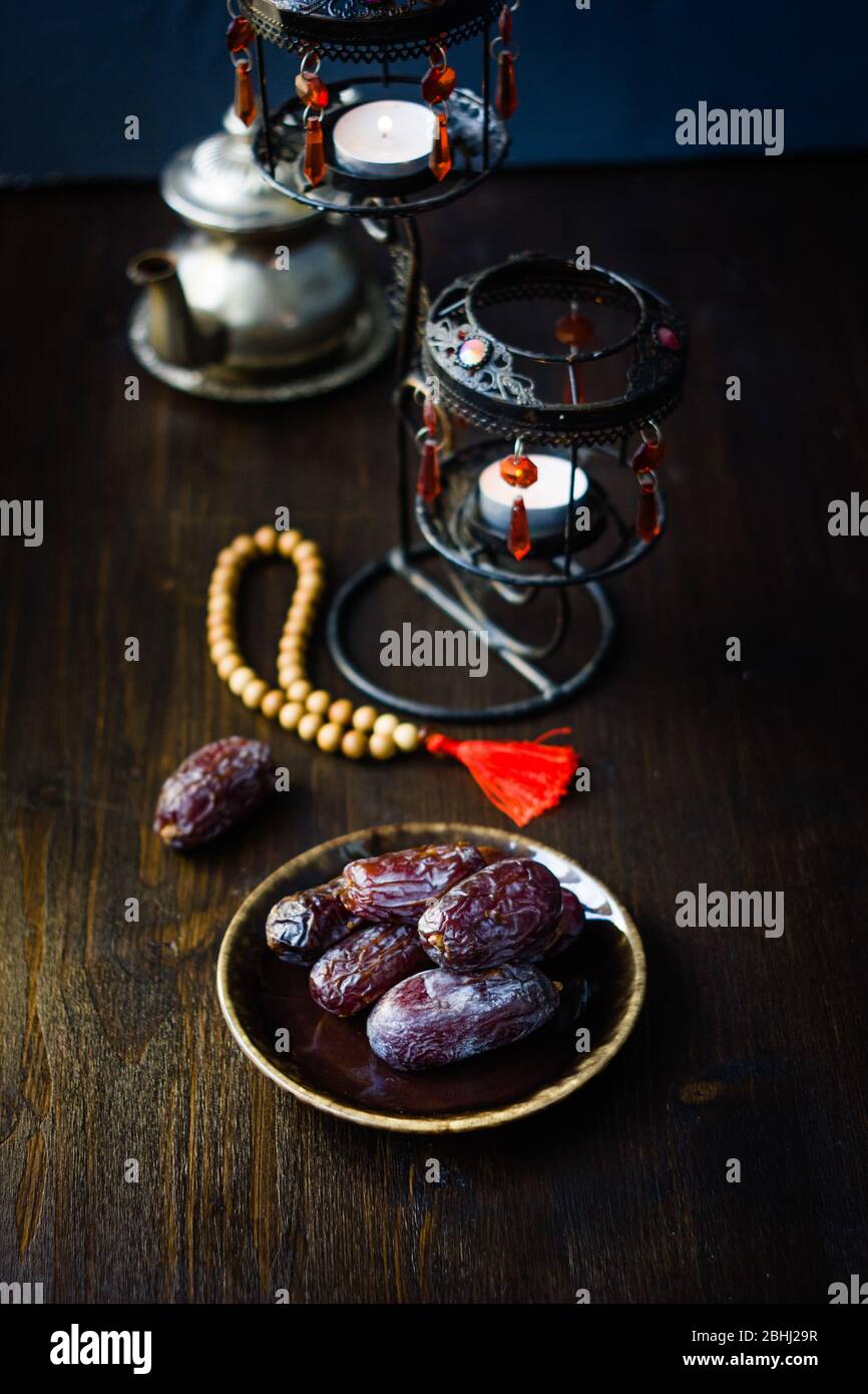 Ramadan dates for iftar opening on plate Stock Photo - Alamy