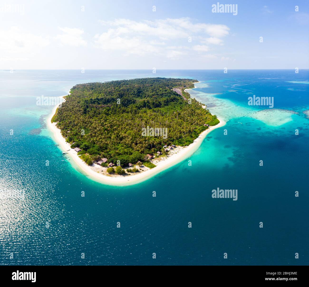Aerial: exotic tropical island secluded destination away from it all ...