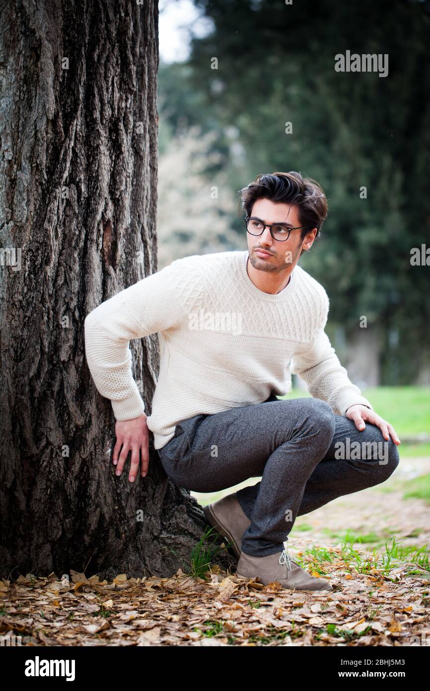 Boy squatting hi-res stock photography and images - Alamy