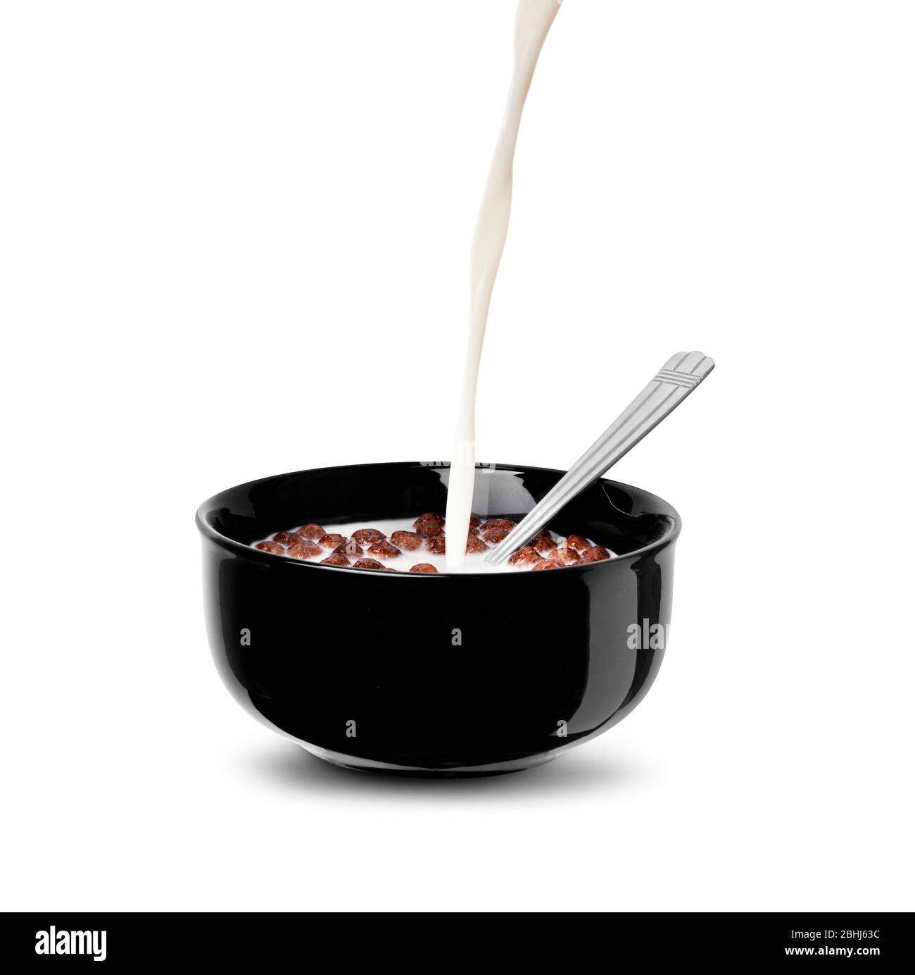 Chocolate flakes pour milk close hi-res stock photography and images ...