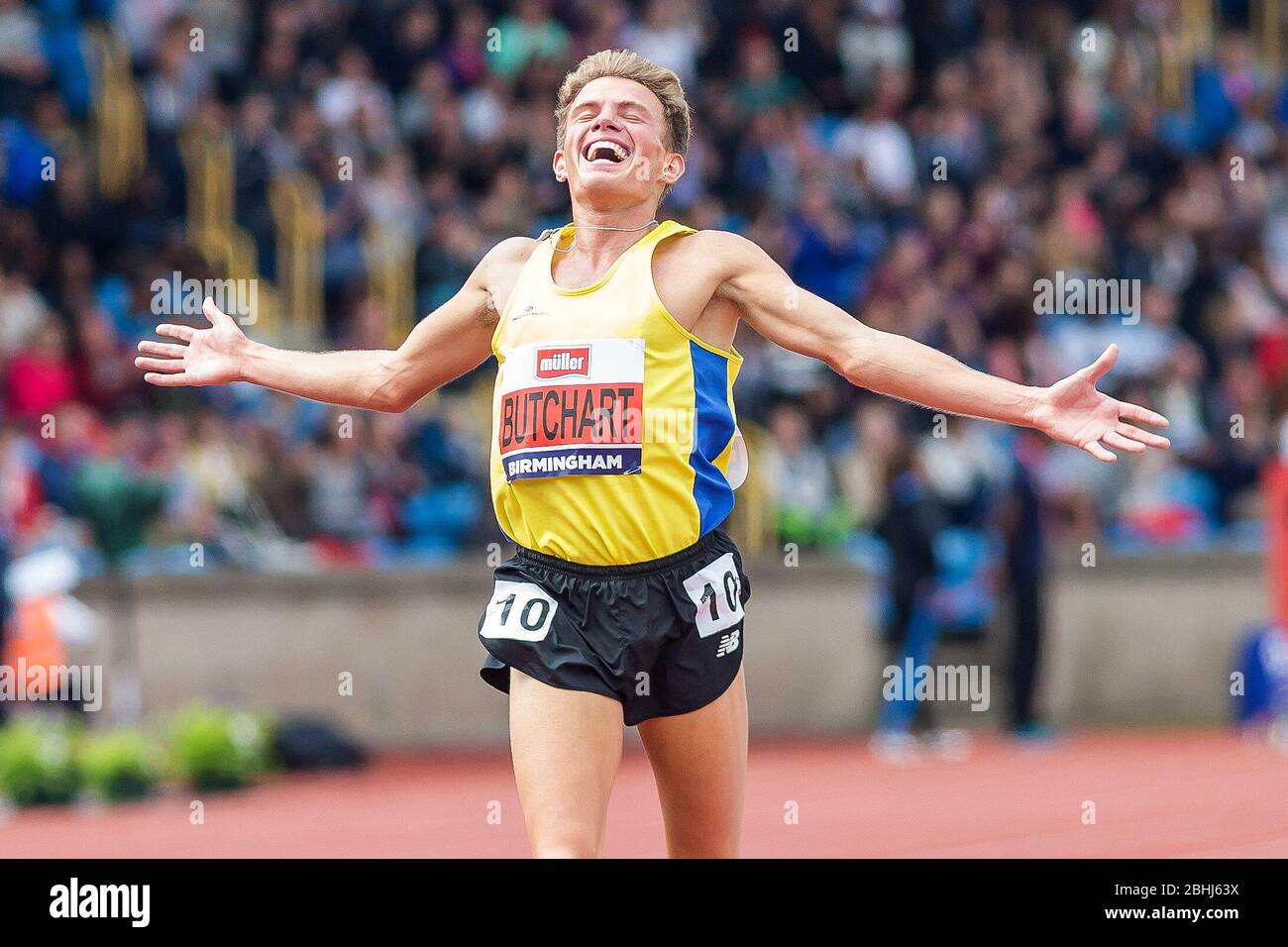 BIRMINGHAM, ENGLAND - Andrew Butchart wins the Men's in a time of 13.14 ...