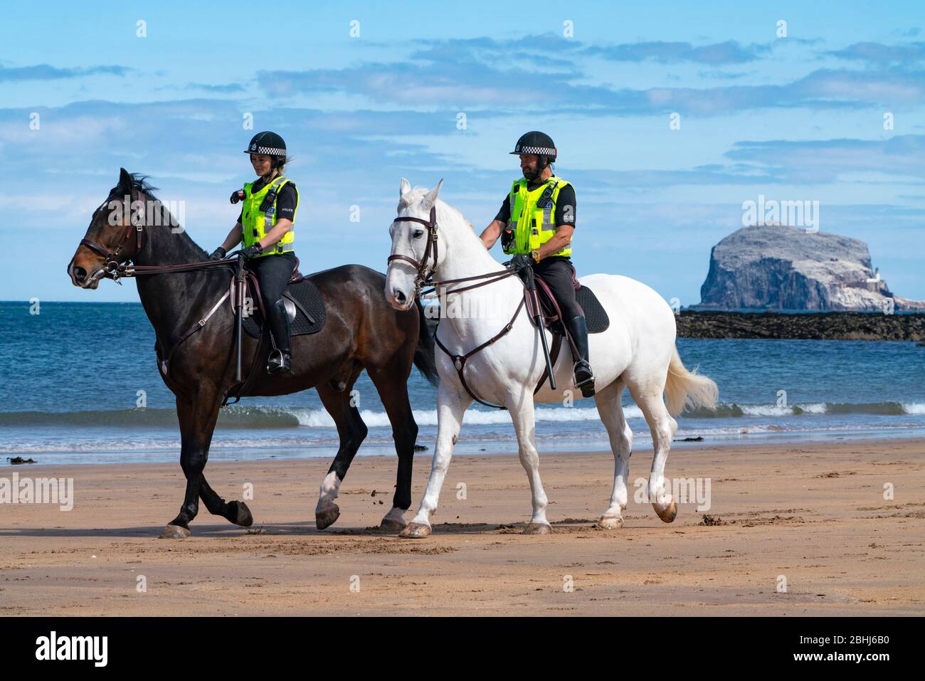 Mounterd police on beach hi-res stock photography and images - Alamy