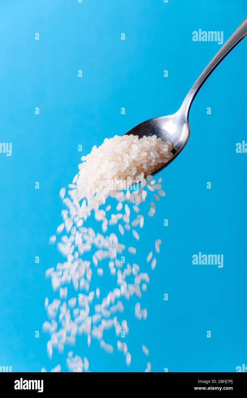 White rice seeds falling on hi-res stock photography and images - Alamy