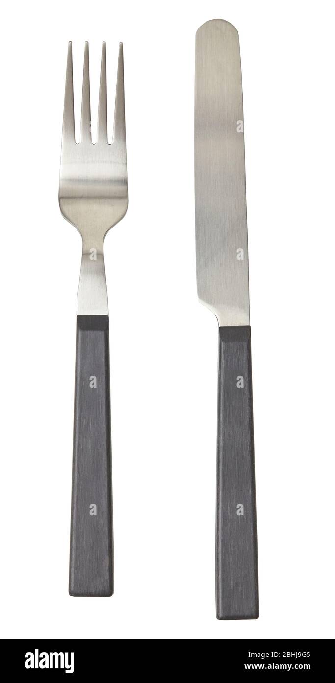 A black handled knife and fork isolated on white background. Close up ...