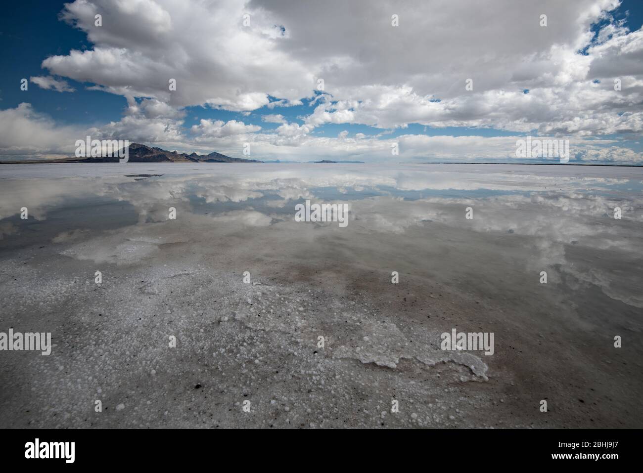 Bonneville Salt Flats after a rainstorm. Reflections of sky and clouds ...
