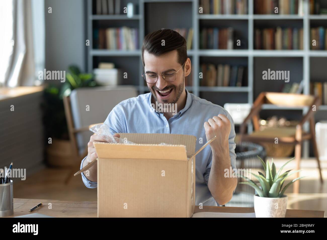 Happy business man receive good hi-res stock photography and images - Alamy