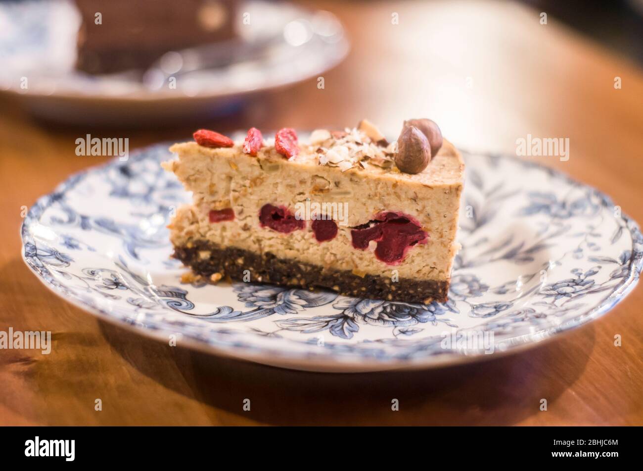 Syroid cake with almonds and cherry. Useful sweets super-food Stock ...