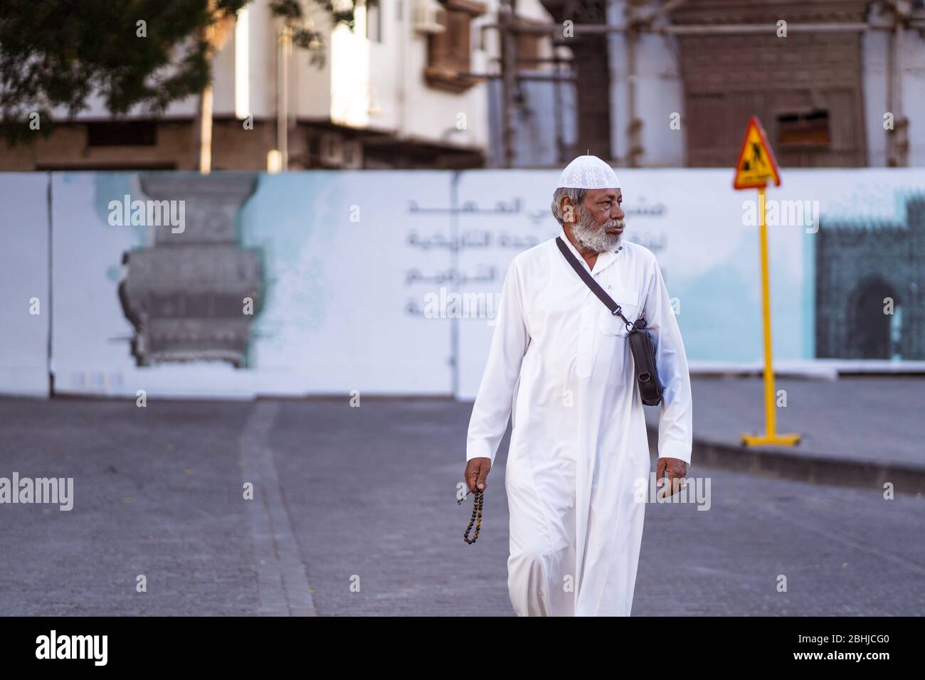 Traditional walking wearing islamic clothes hi-res stock photography ...
