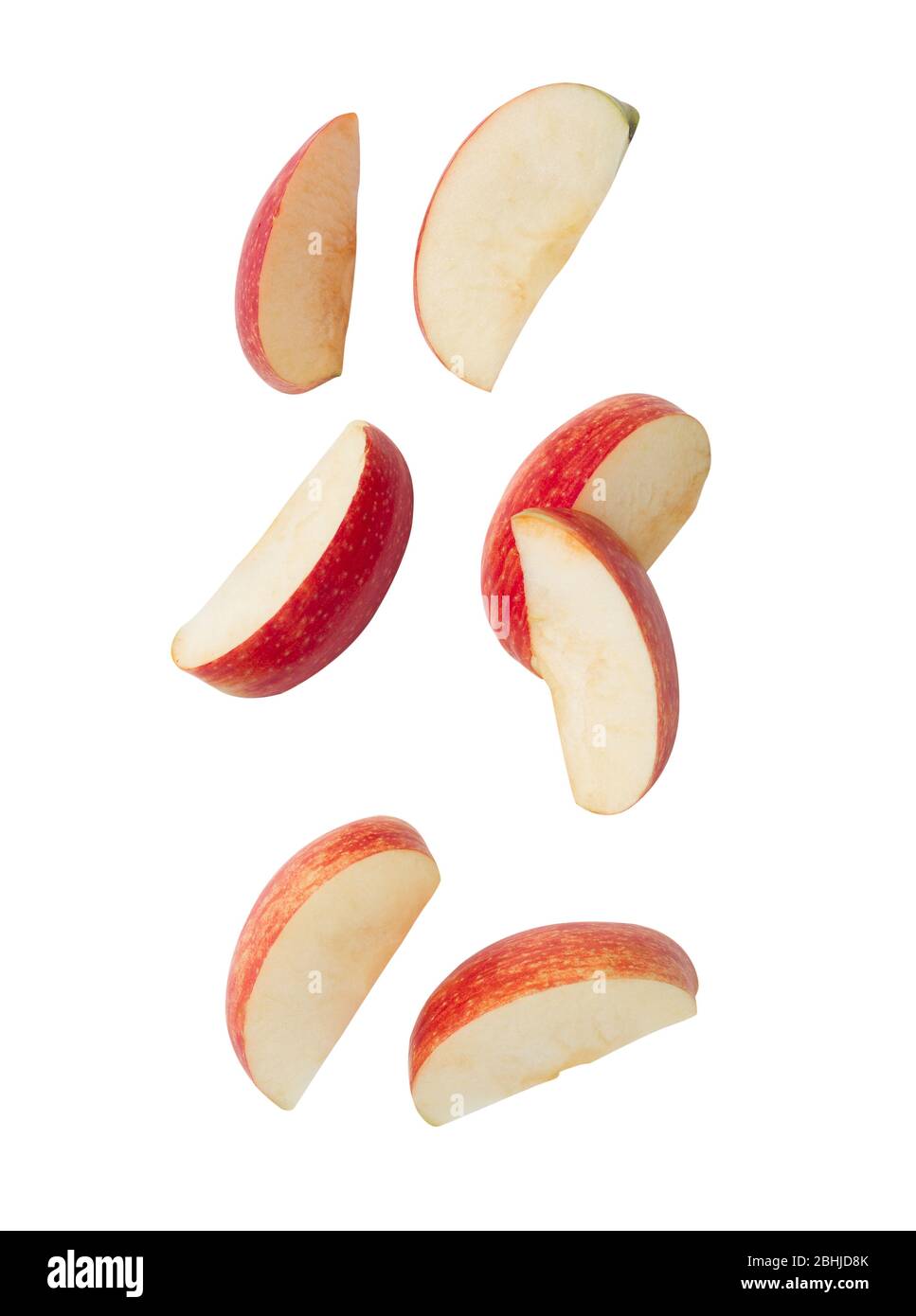 Falling red apple slice isolated on white background with clipping path ...