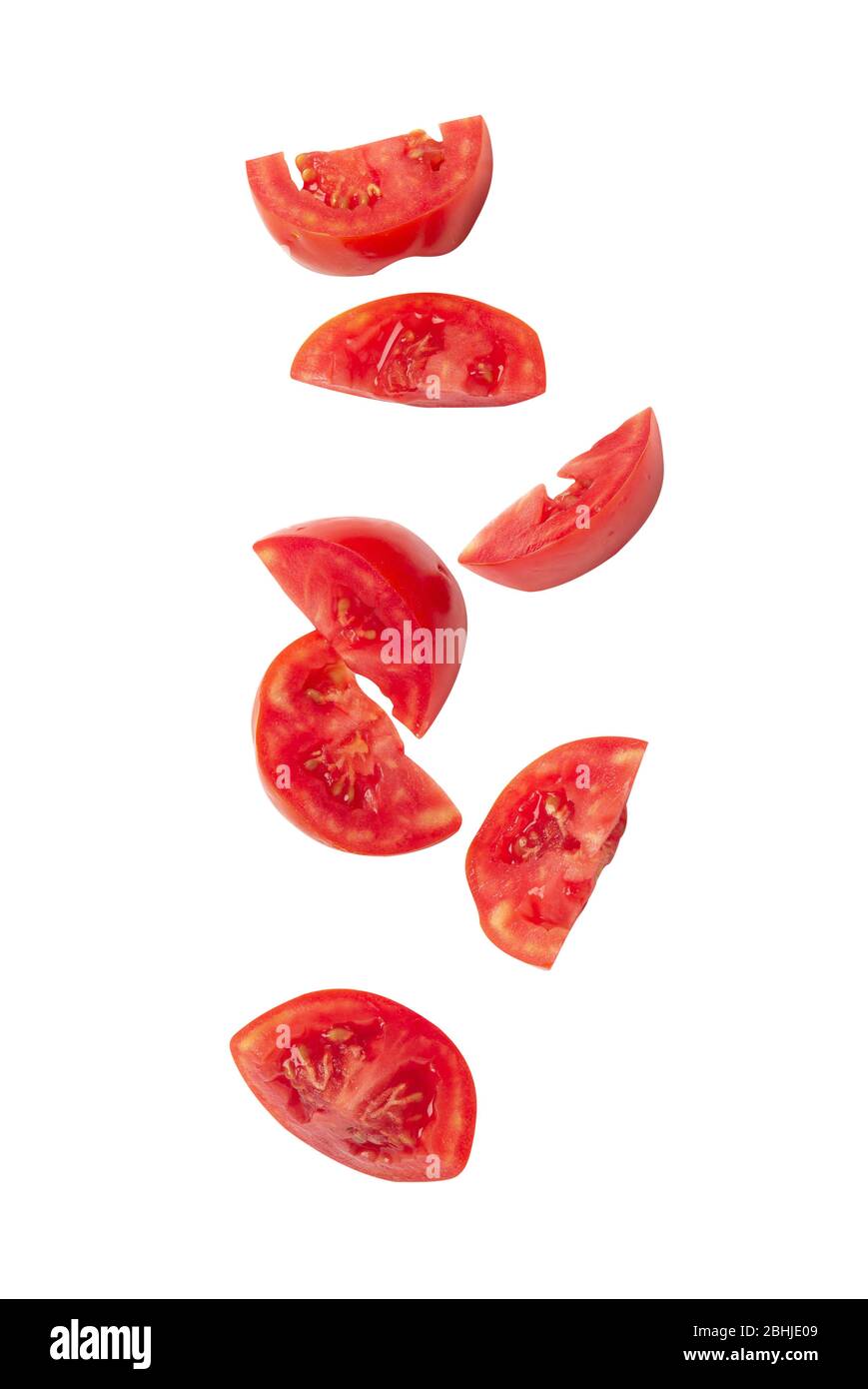 Falling tomato slice isolated on white background with clipping path ...