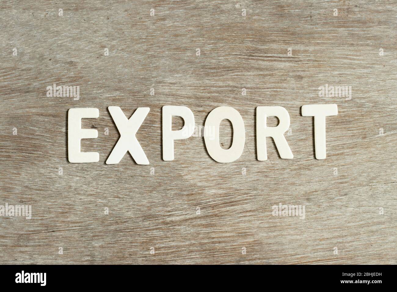Alphabet letter in word export on wood background Stock Photo - Alamy